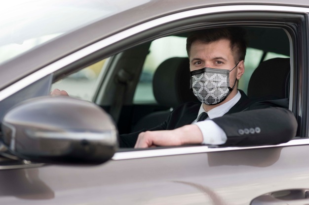 driver-with-fabric-mask-face_23-2148591996.jpg